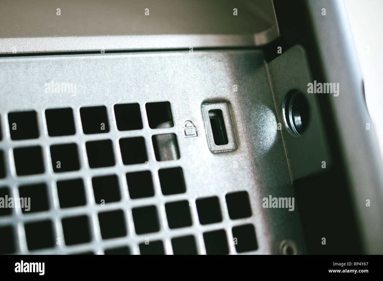 Kensington lock on the rear part of a powerful workstation with lock ...