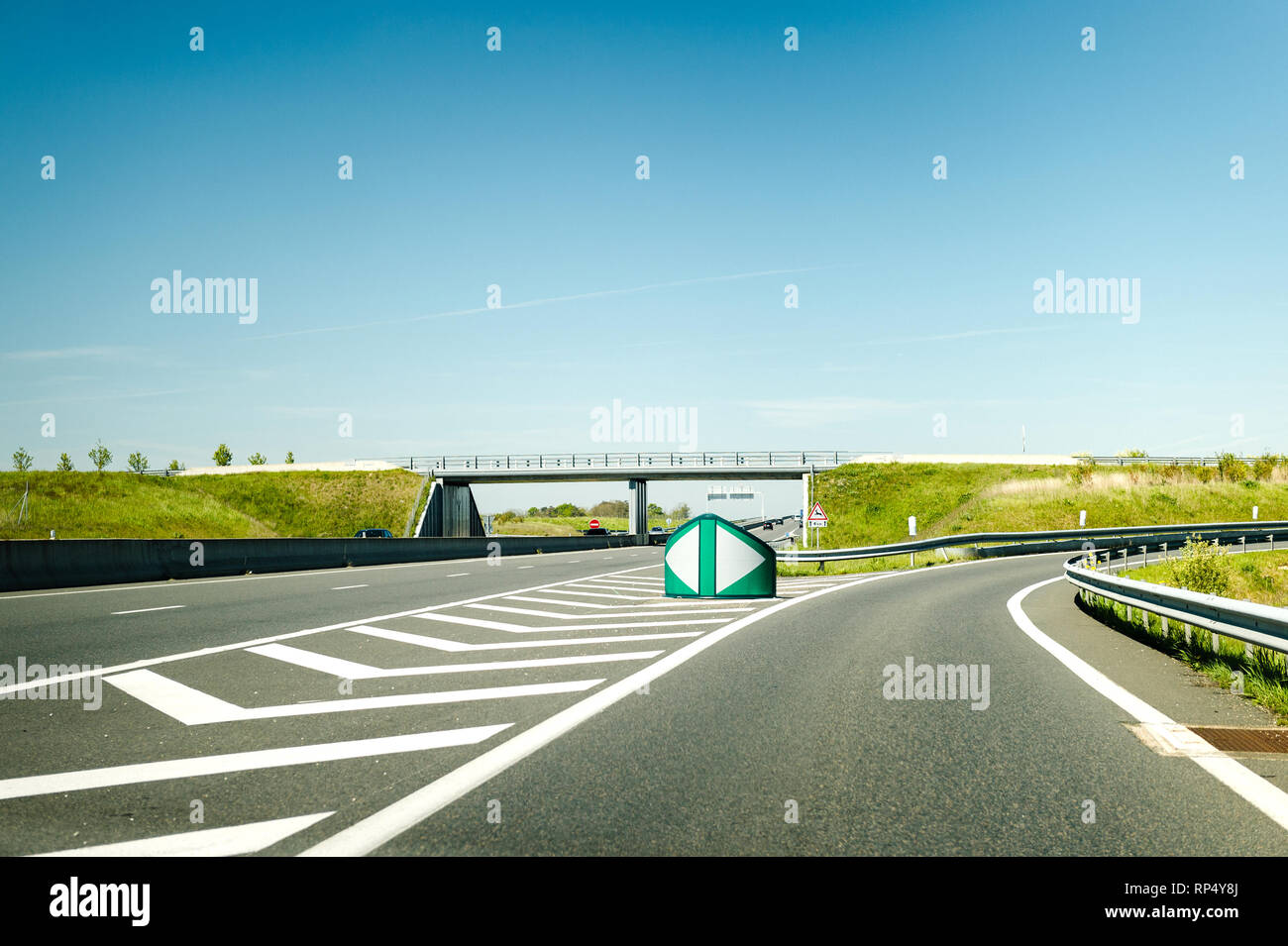 French autoroute highway exit on the right with security differentiator ...