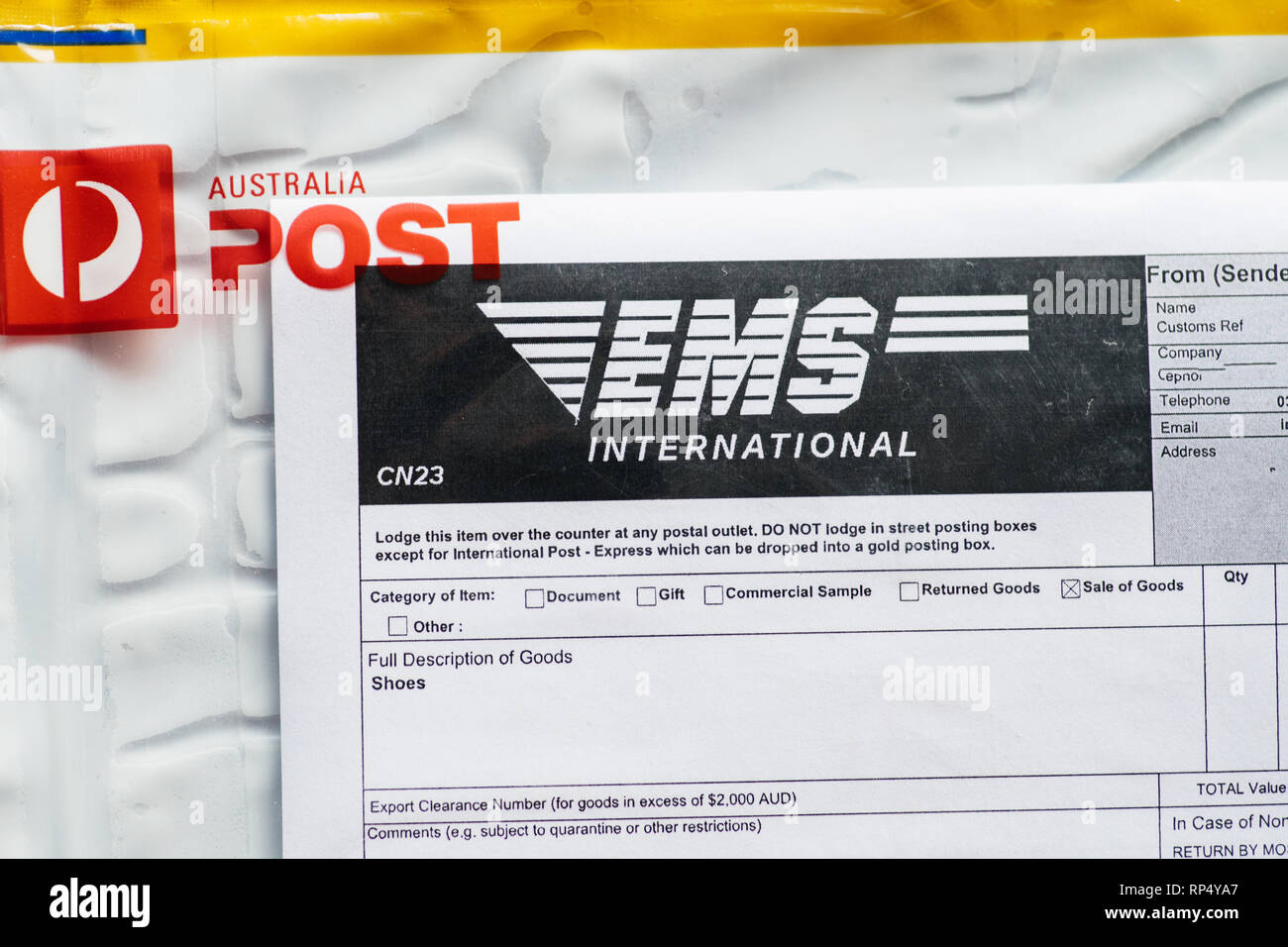 LONDON, UK - FEB 27, 2018: Macro detail of EMS post parcel package received by mail from ...