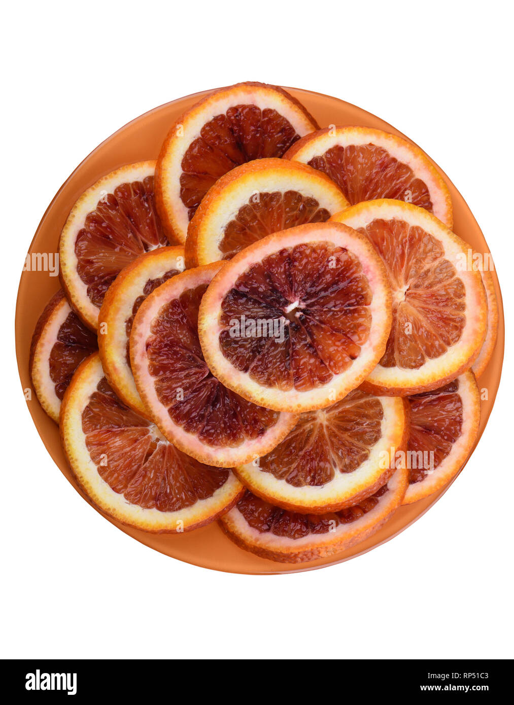 Slices of ripe juicy blood orange on orange plate isolated on white ...
