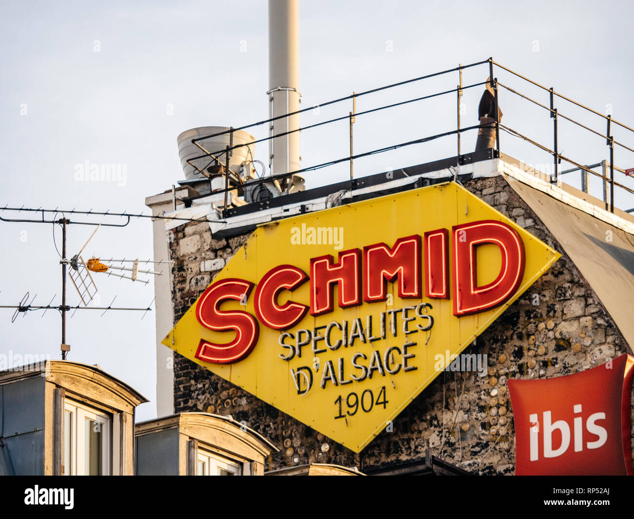 PARIS, FRANCE - OCT 13, 2018: Schmid Specialites d'Alsace neon sign on ...