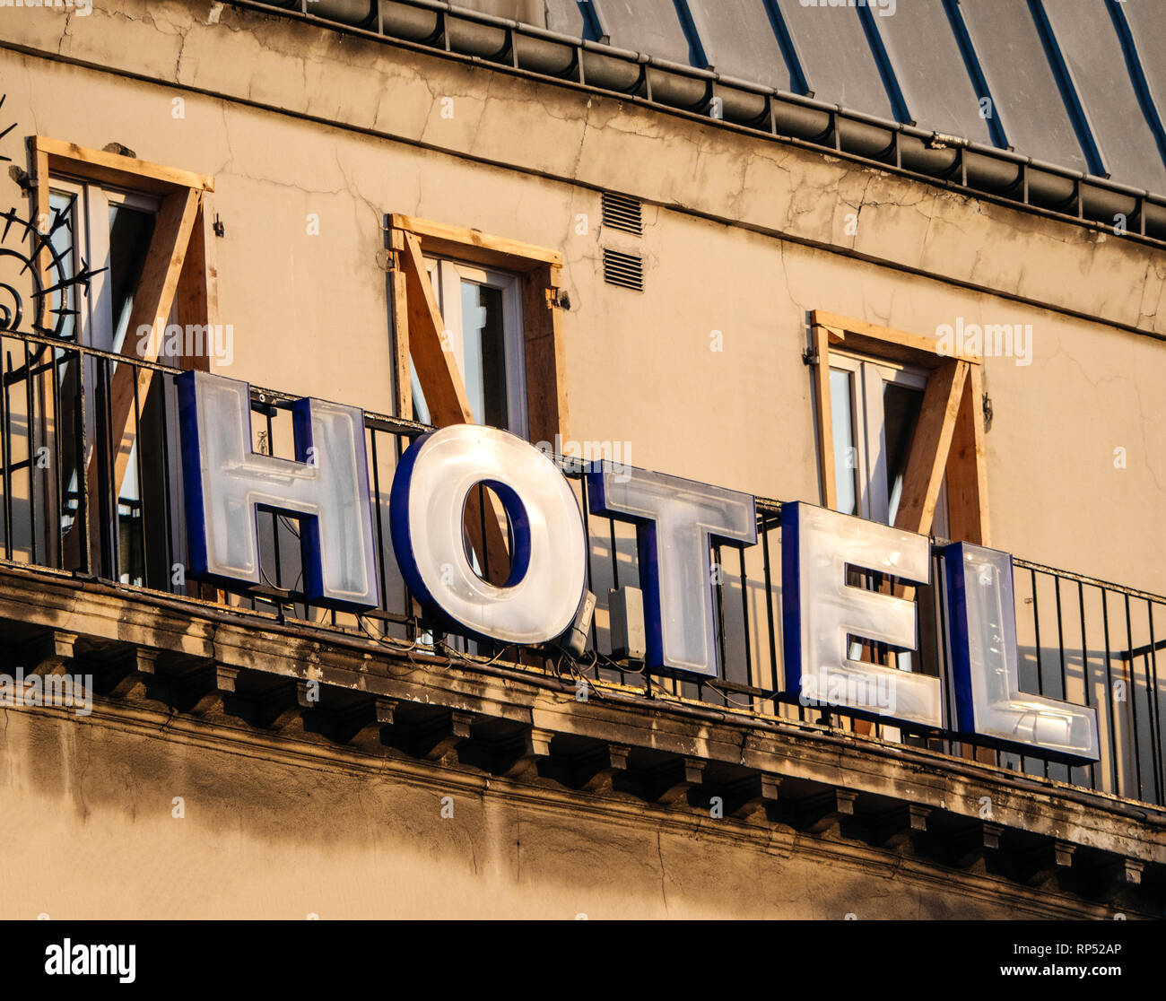 Hotel sign on the facade of old hausmannian building in central Paris ...