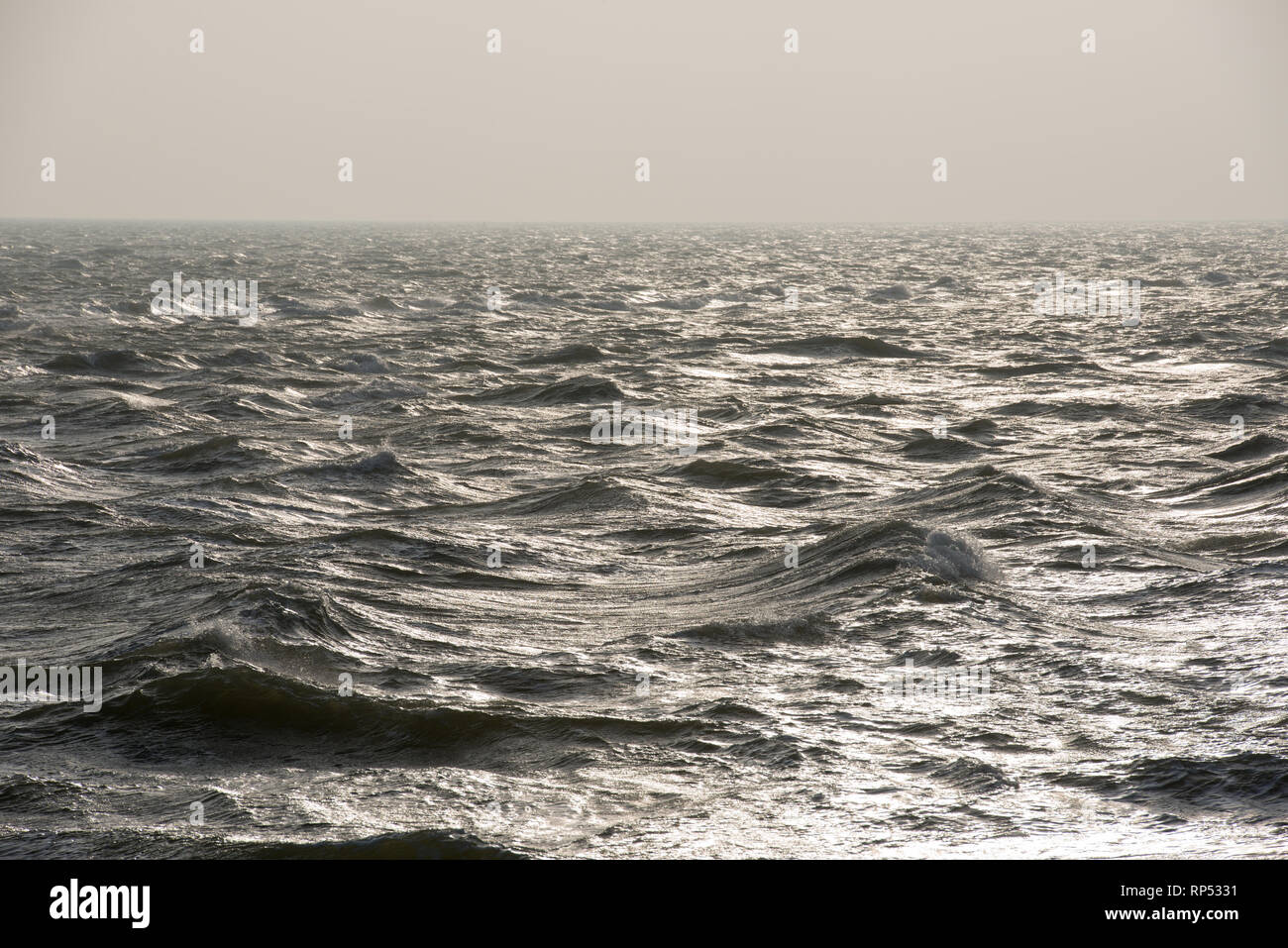 Water surface on a windy day in the north sea with waves and rough sea ...