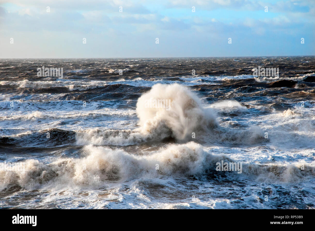 Waves building up against the seawall in strong winds on north shore ...