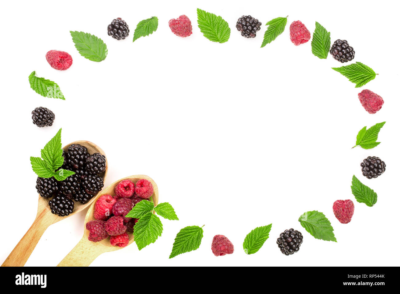 Raspberry blackberry frame isolated on white background with copy space ...