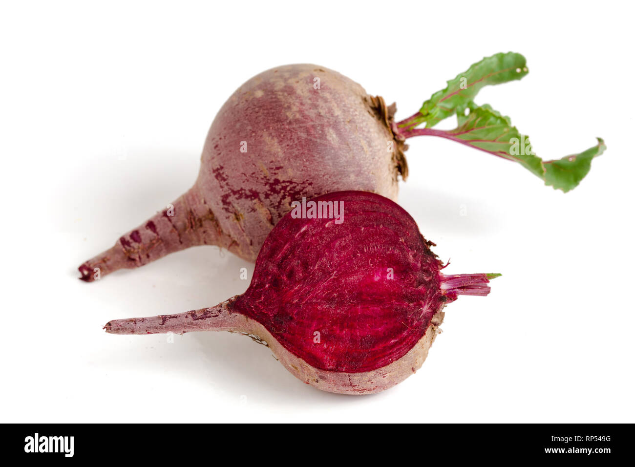 beetroot and half with leaf isolated on white background Stock Photo ...
