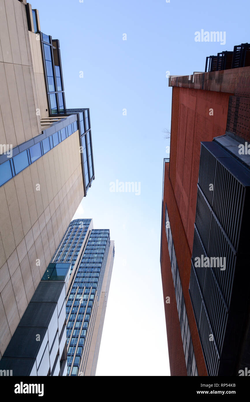 View of tall city office buildings from below Stock Photo - Alamy