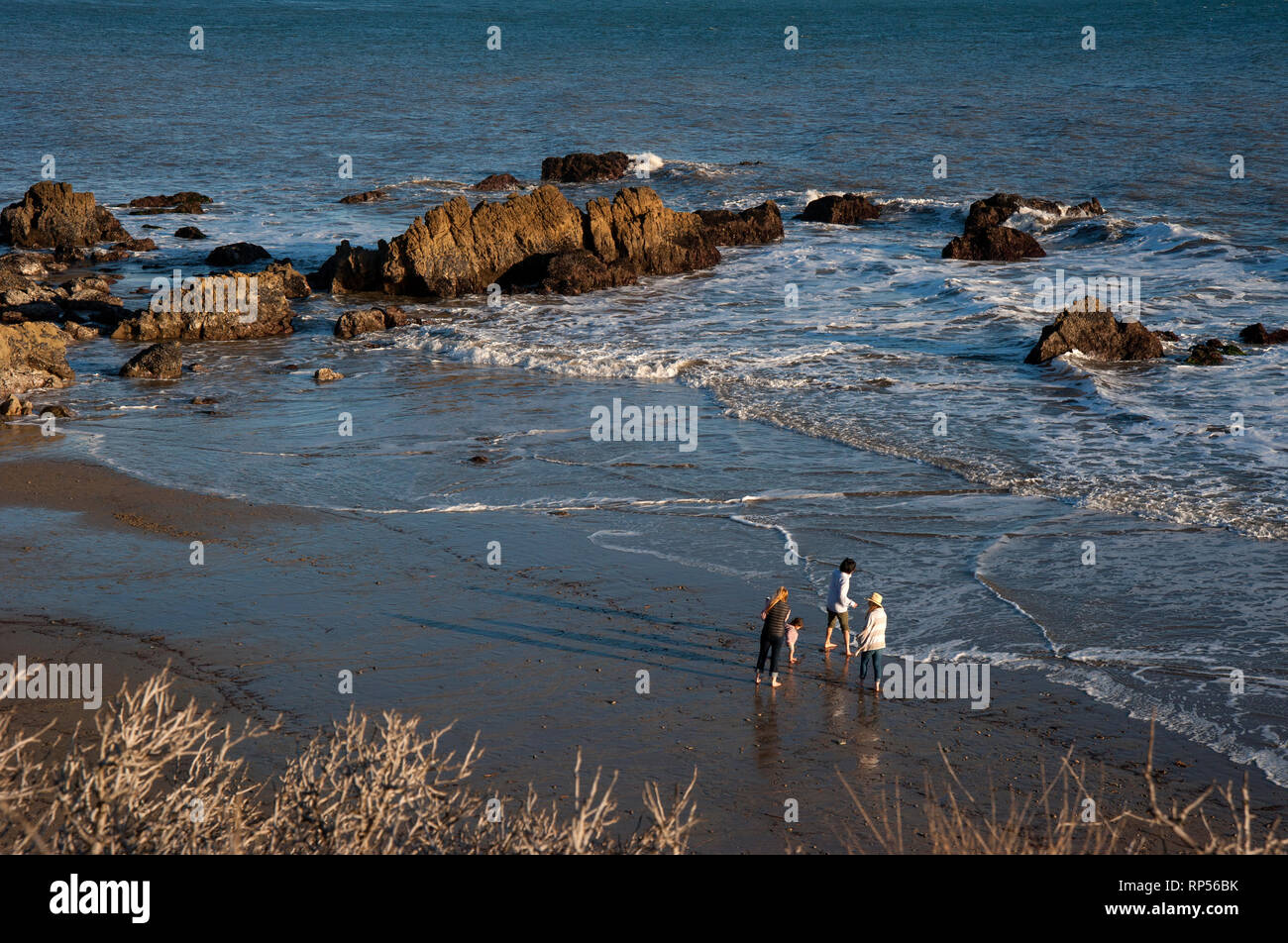 People enjoying the beach in Malibu, CA Stock Photo - Alamy
