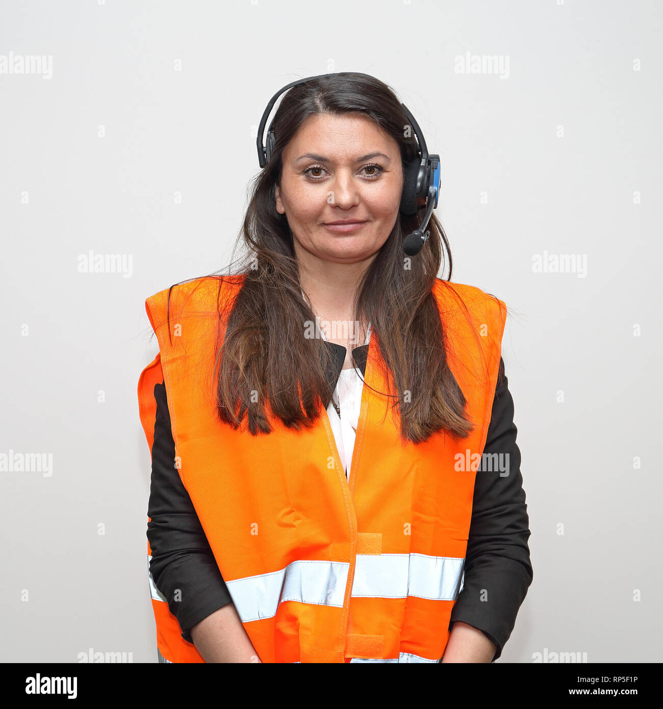 Brunette Woman Worker With Wireless Headset Voice Picking System ...