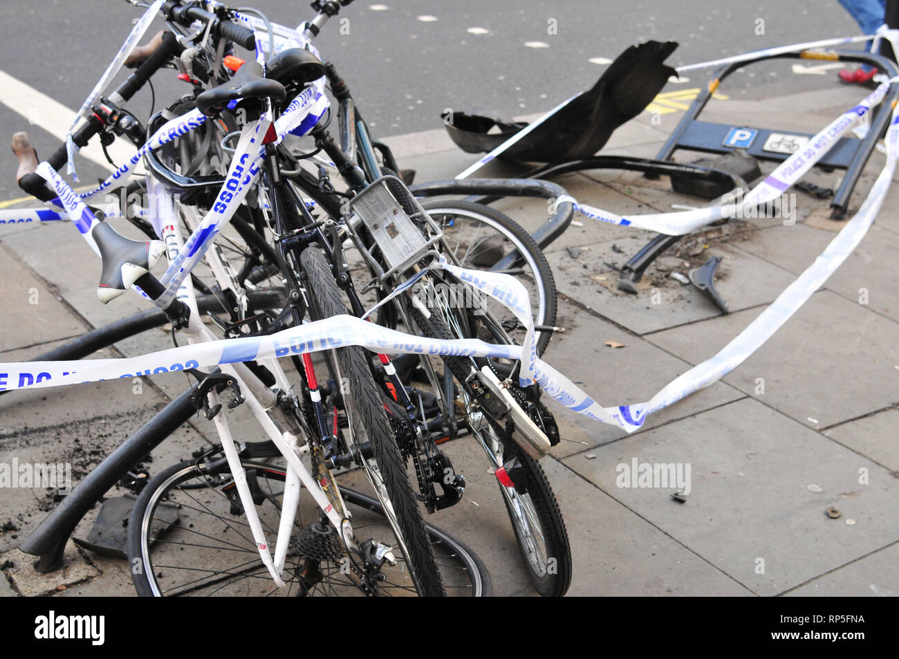Photography of London bicycle rack and bicycles damaged in an road ...