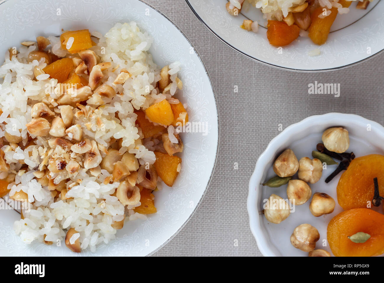 Rice with dried fruit and nuts Stock Photo - Alamy