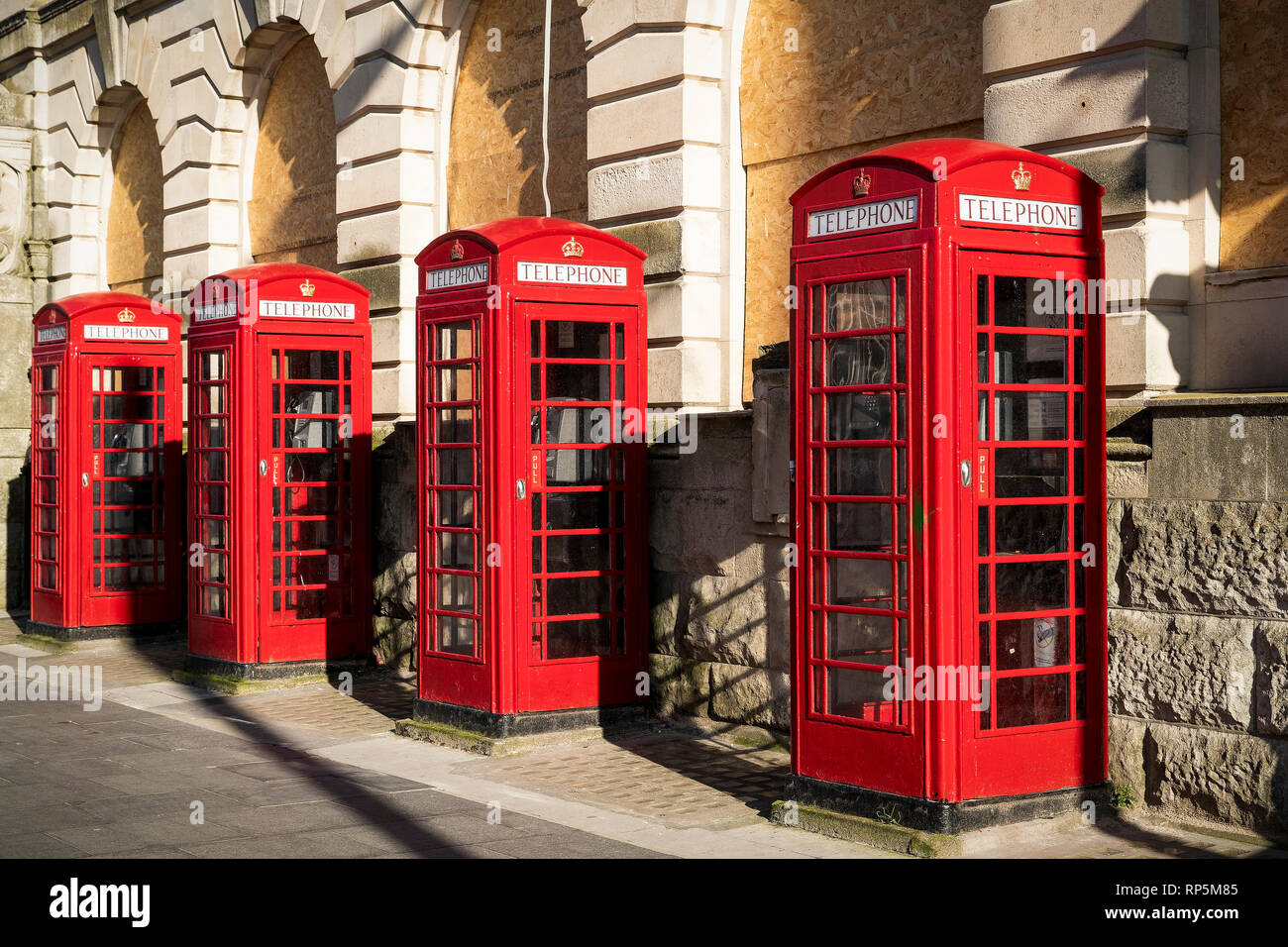 Four Red Telephone Boxes Stock Photo - Alamy