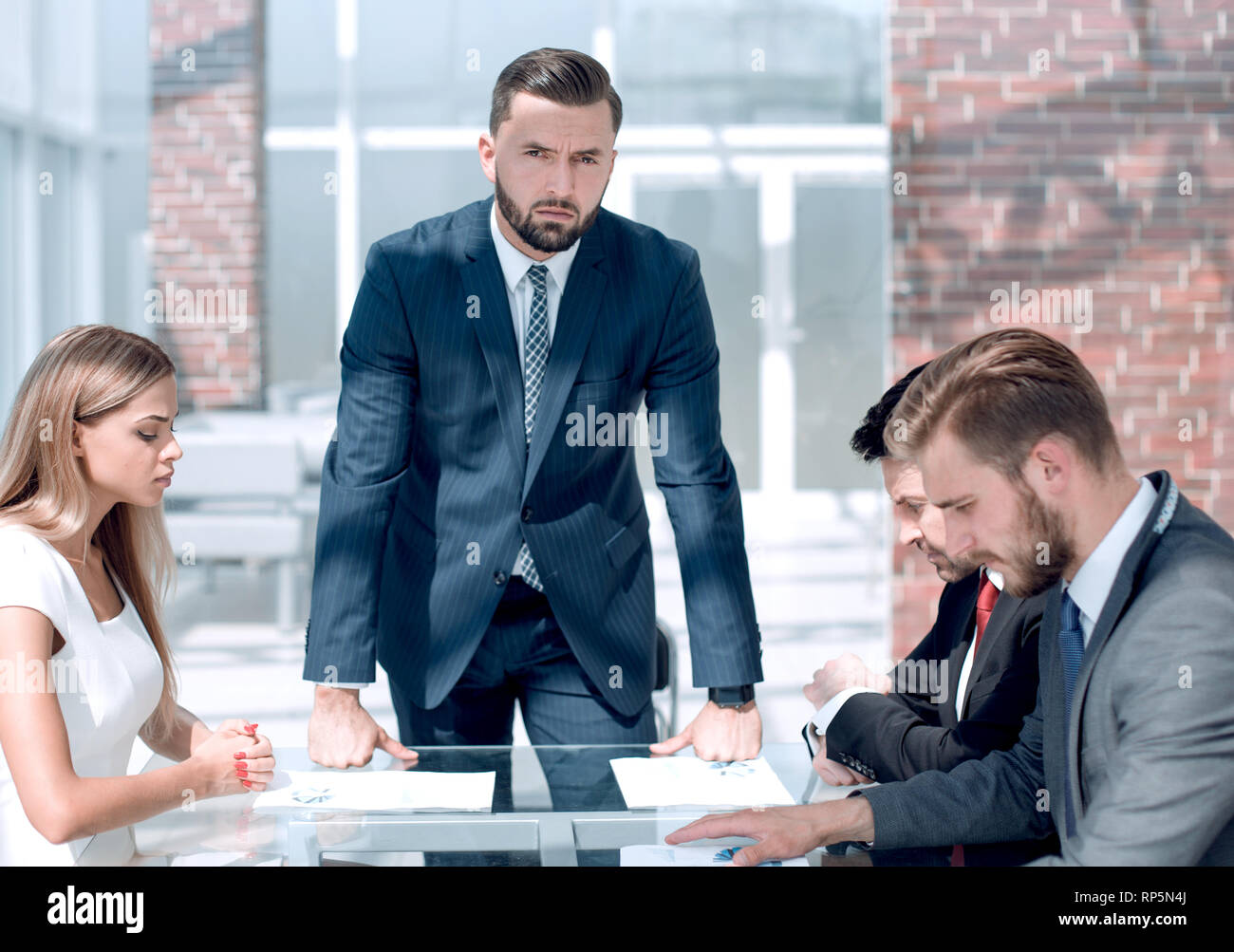 strict businessman at a meeting in the office Stock Photo - Alamy
