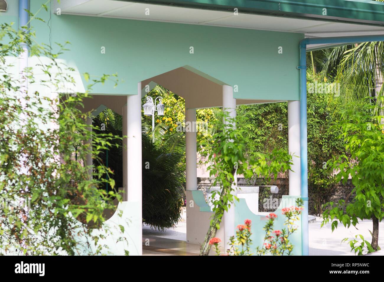 Typical maldivian house with a garden and decorative plants (Ari Atoll ...