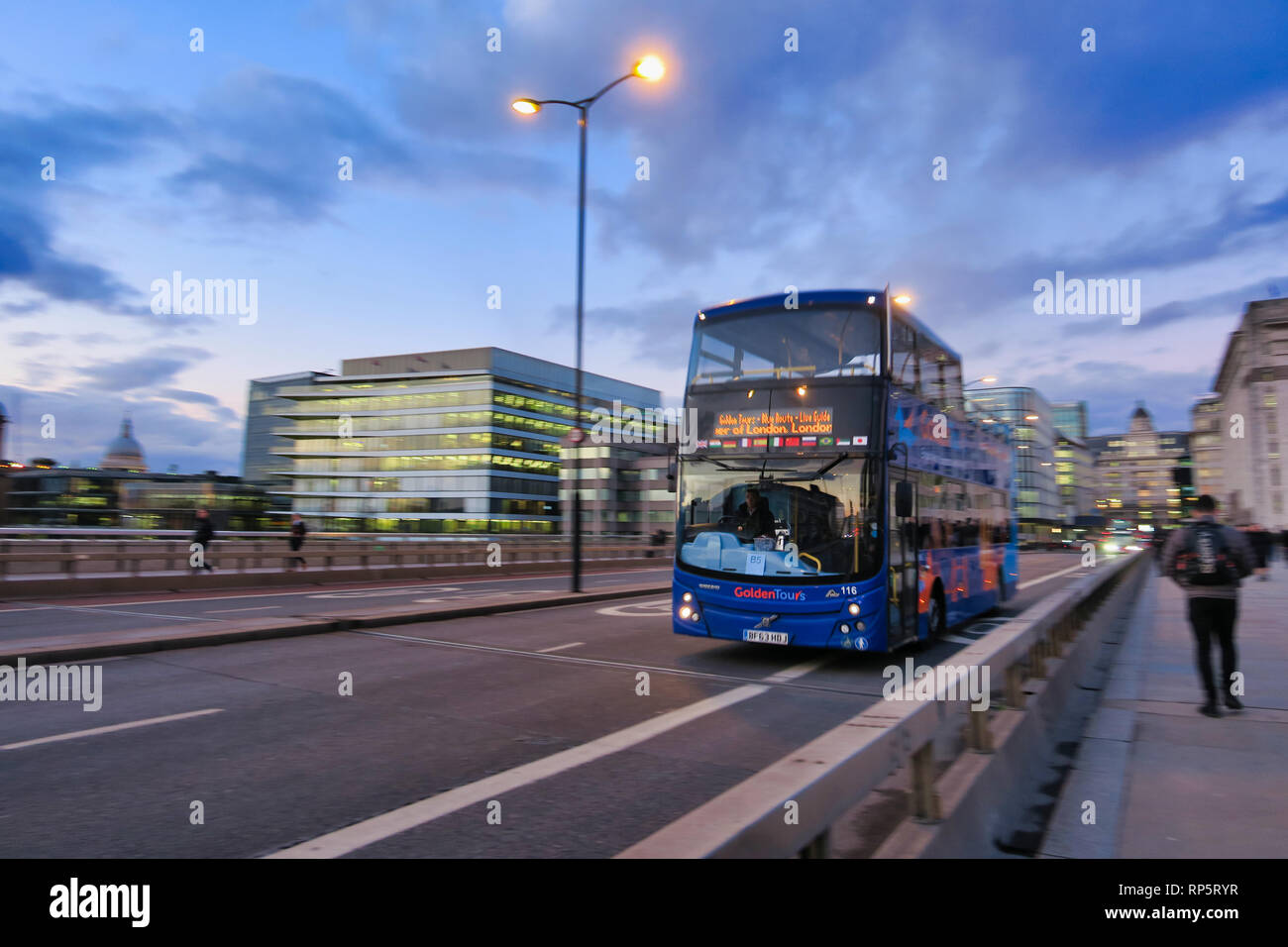 Tour bus moving over London Bridge, London, England, UK Stock Photo - Alamy