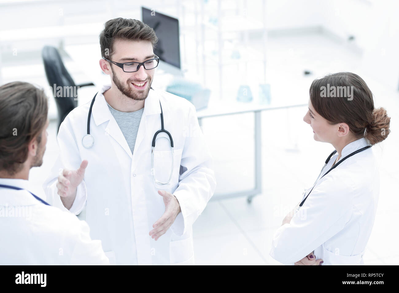 Group of doctors talking Stock Photo - Alamy