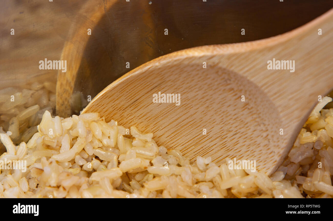Cooked rice on wooden hi-res stock photography and images - Alamy