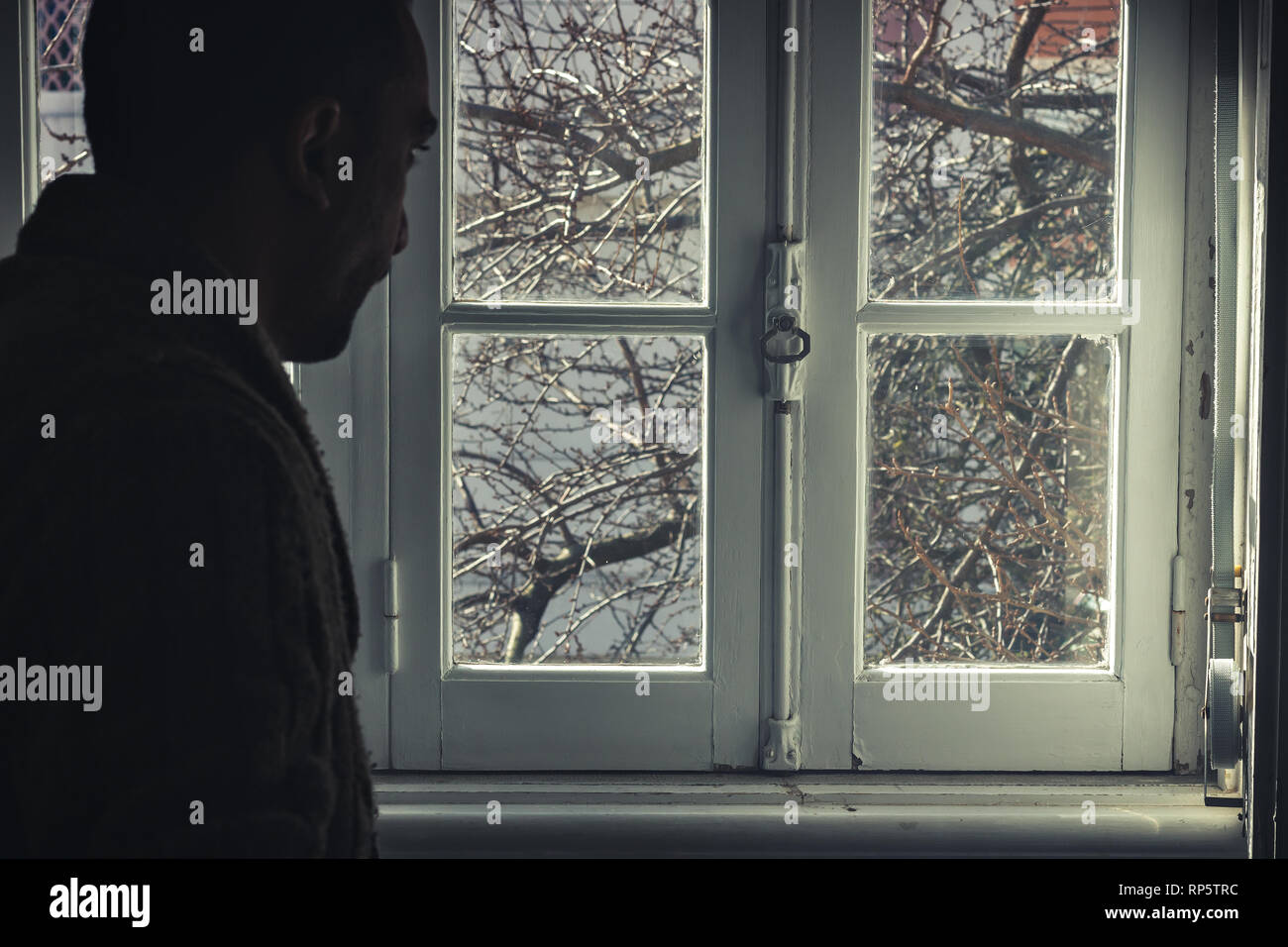 A man looking, interior home, vintage window Stock Photo - Alamy