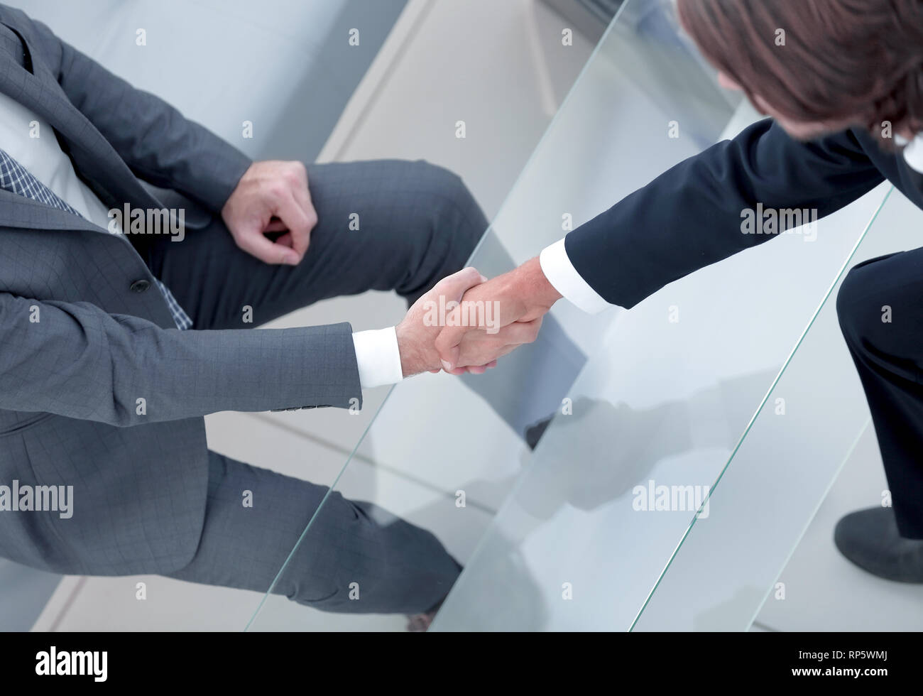 colleagues shaking hands in office Stock Photo - Alamy