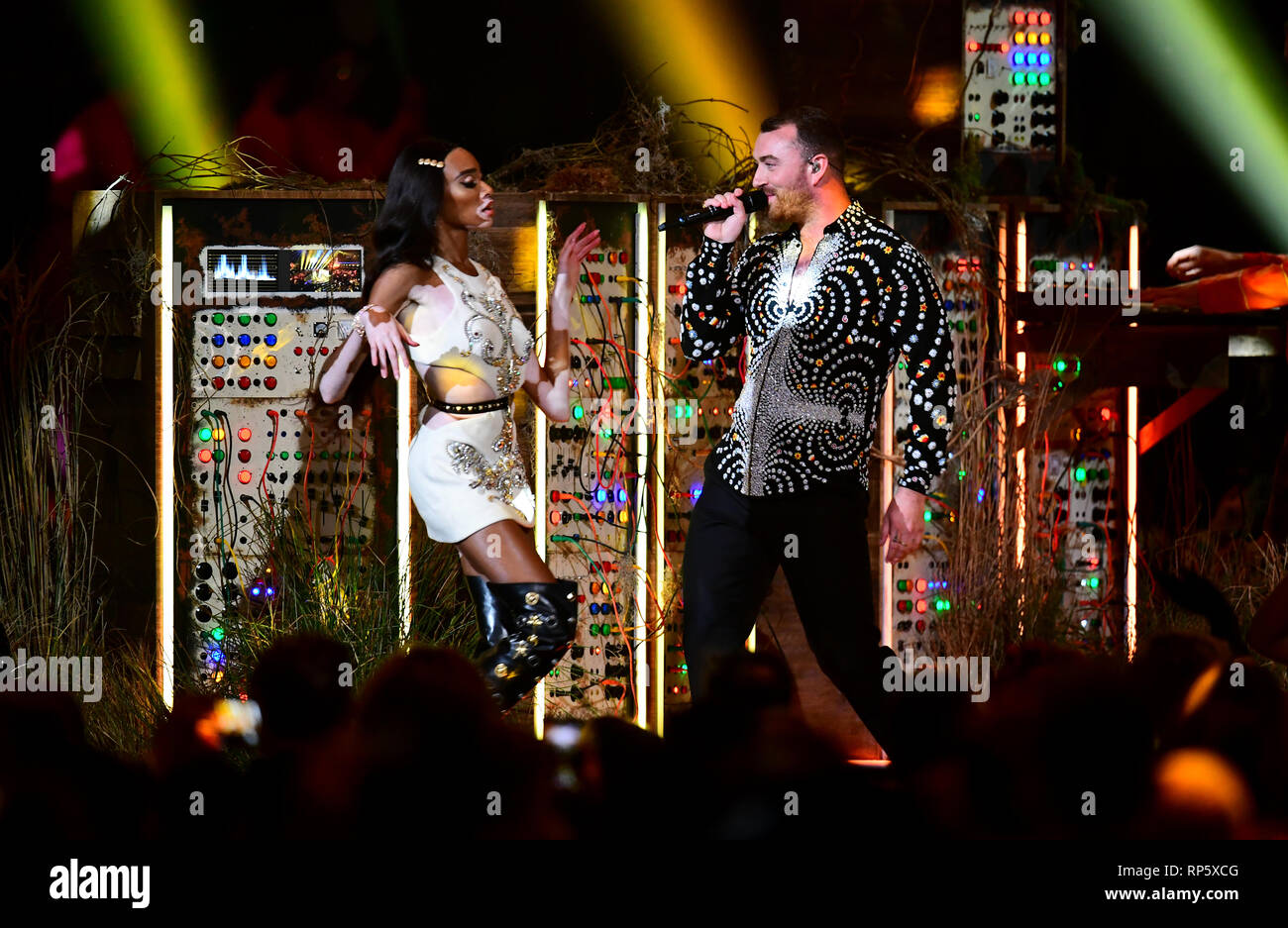 Winnie Harlow and Sam Smith on stage at the Brit Awards 2019 at the O2 ...