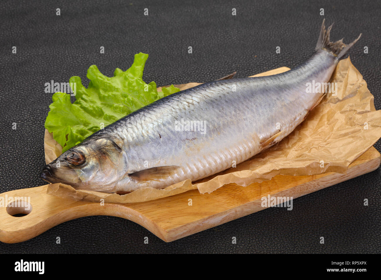 Salted herring fish ready for eat Stock Photo - Alamy