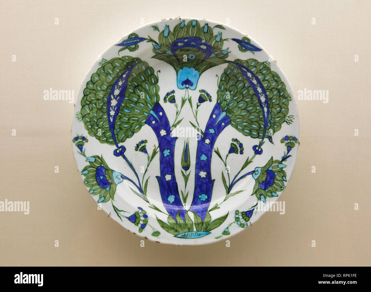 Iznik fritware (stone-paste) deep plate with trees painted under the ...
