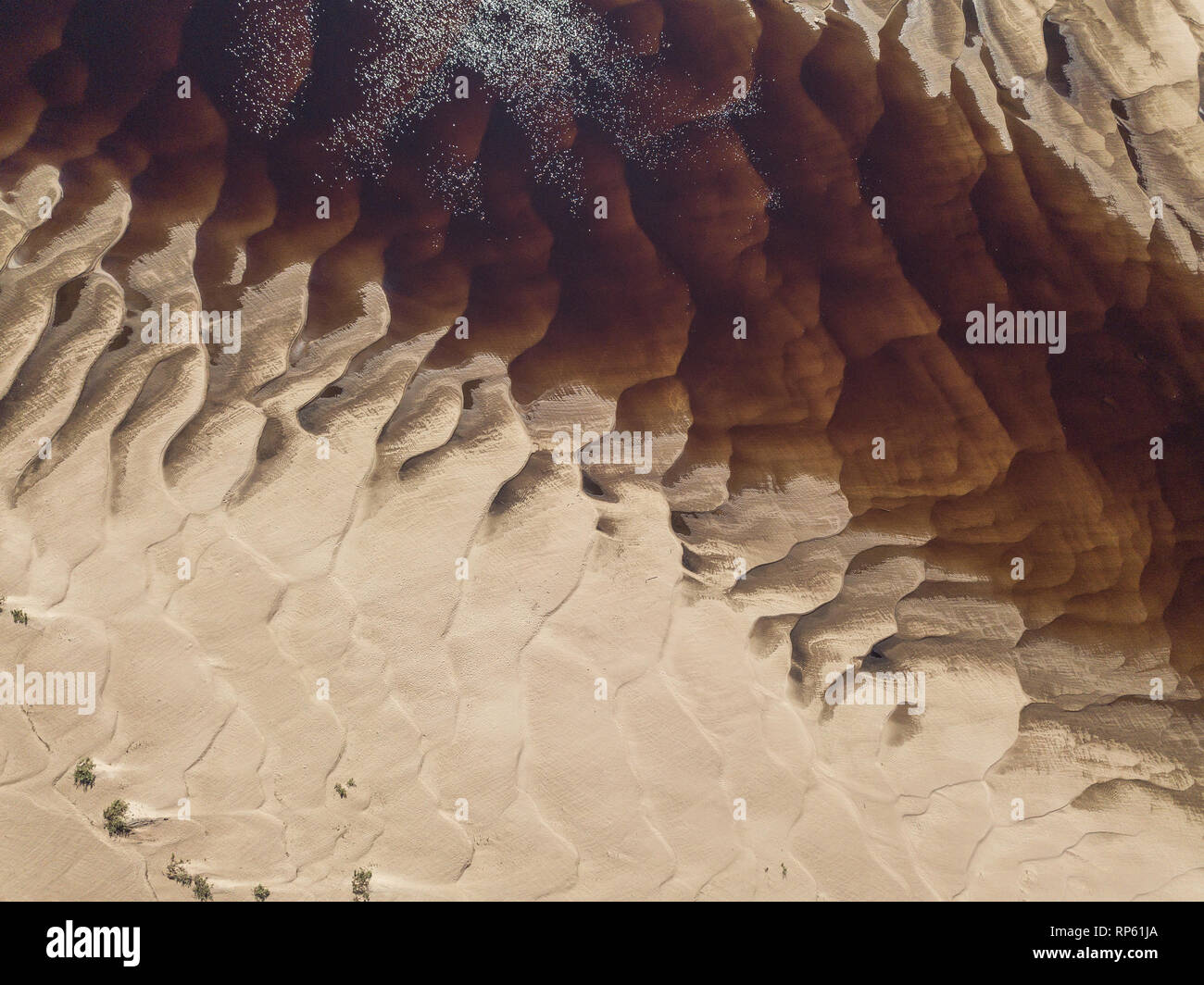 Aerial view of sandy stretches on the forest river Stock Photo - Alamy