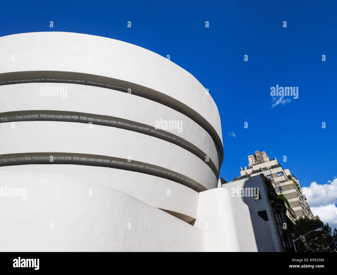 Closeup, of exterior of round white walls of Guggenheim museum in New ...