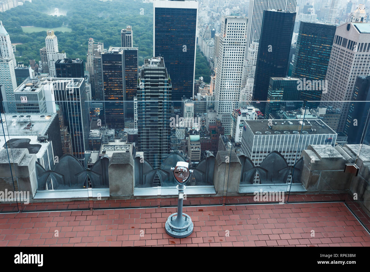 View of Central Park rimmed by tall buildings from rooftop Stock Photo ...