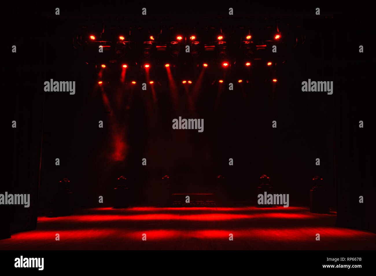 Free stage with lights, lighting devices. Night show Stock Photo - Alamy