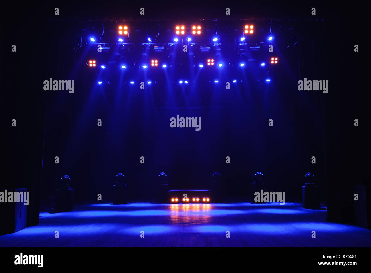 Free stage with lights, lighting devices. Night show Stock Photo - Alamy