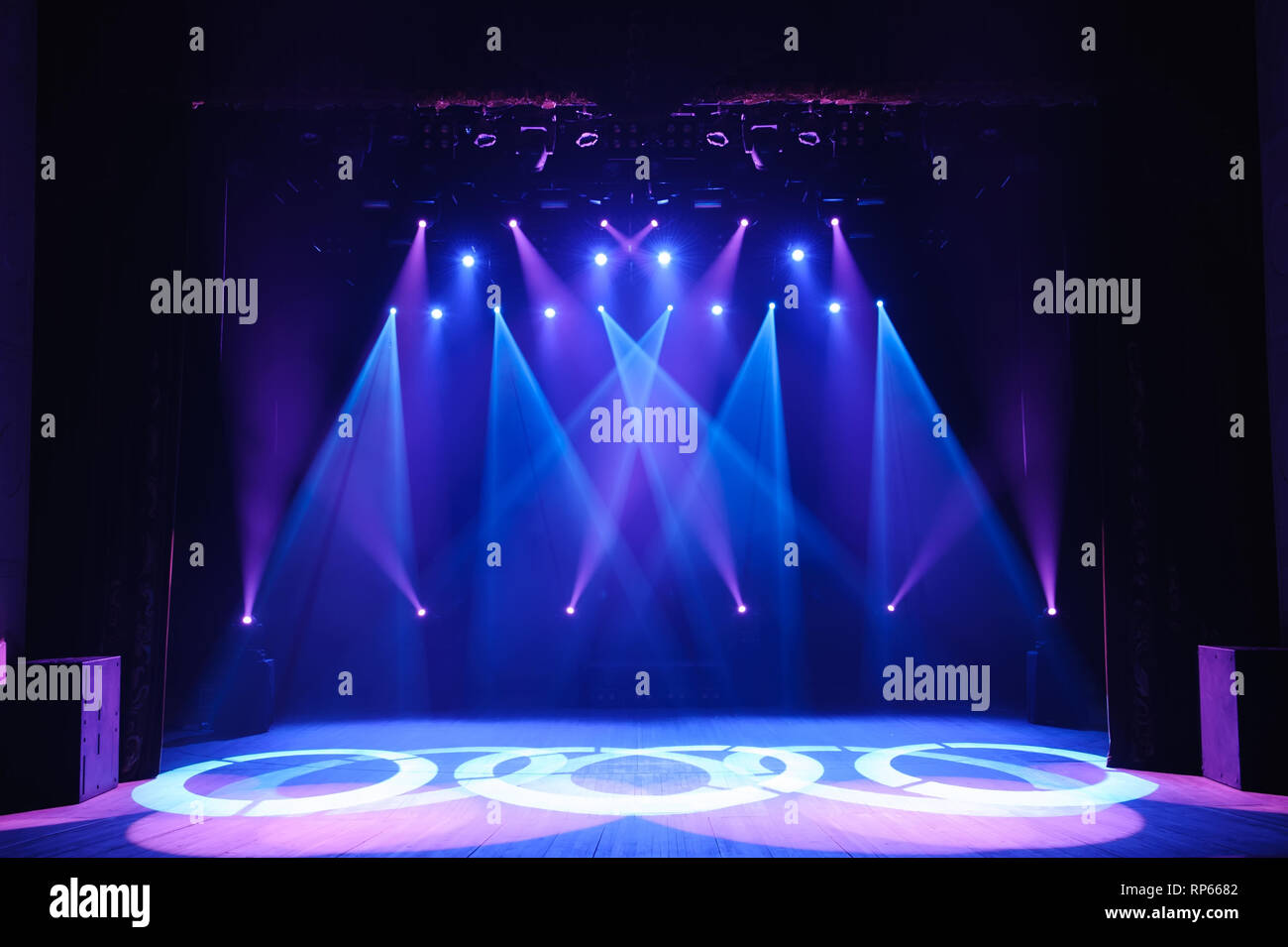 Free stage with lights, lighting devices. Night show Stock Photo - Alamy
