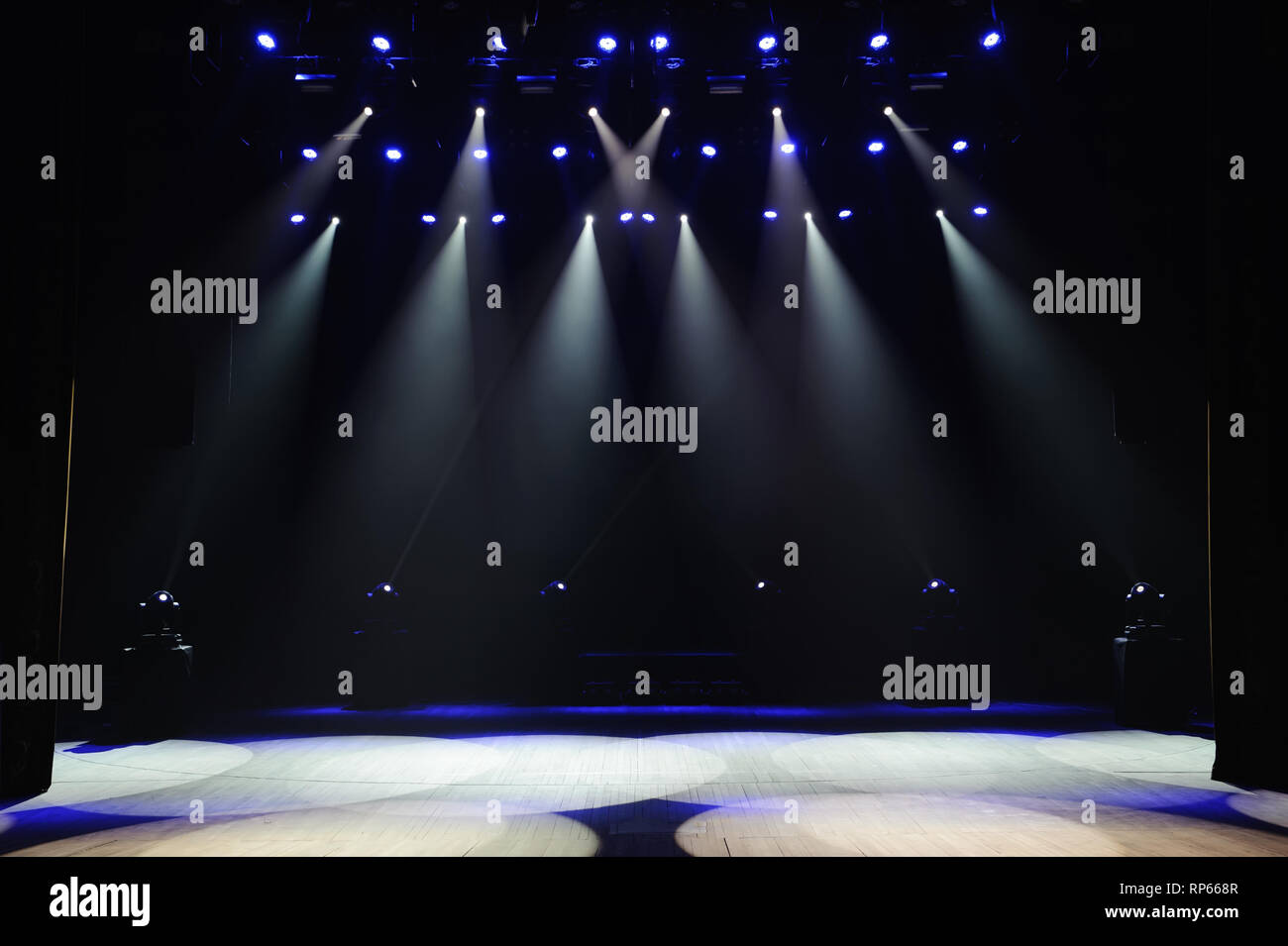 Free stage with lights, lighting devices. Night show Stock Photo - Alamy