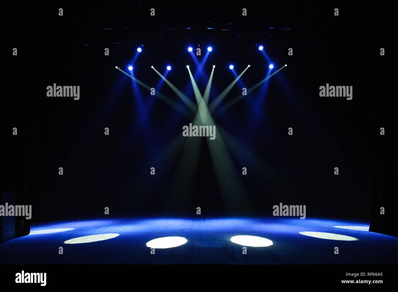 Free stage with lights, lighting devices. Night show Stock Photo - Alamy