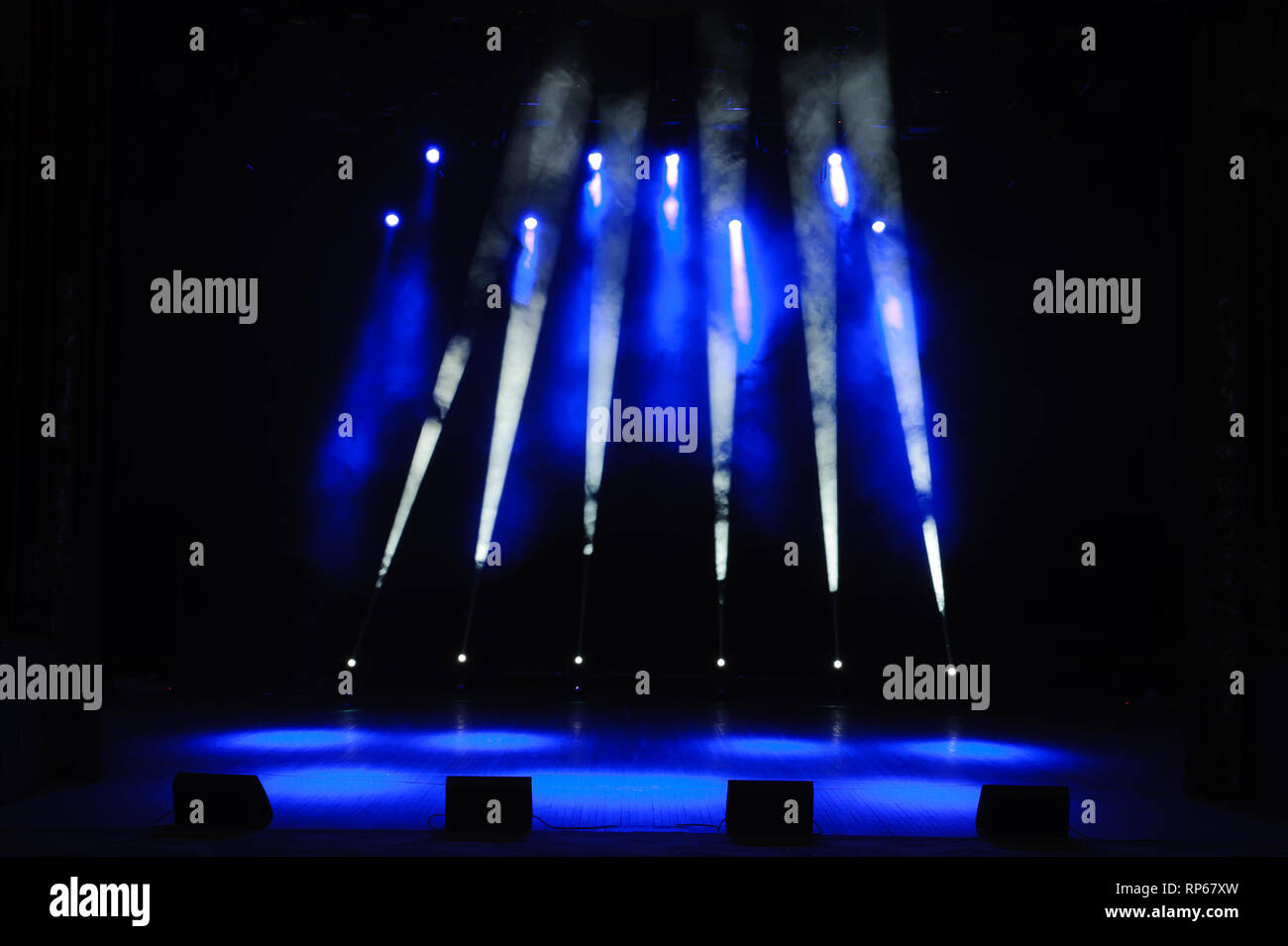 Free stage with lights, lighting devices. Night show Stock Photo - Alamy