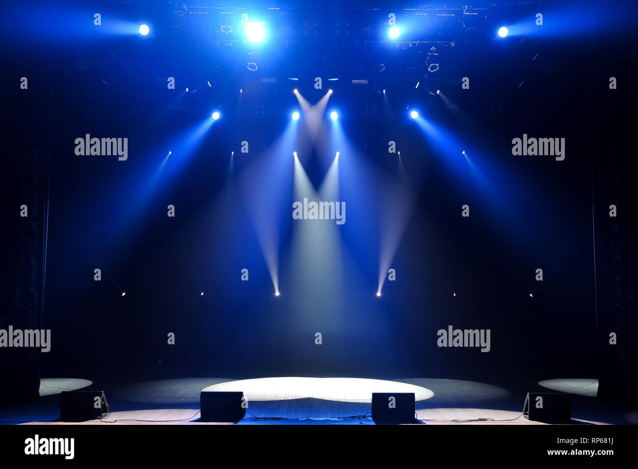Free stage with lights, lighting devices. Night show Stock Photo - Alamy