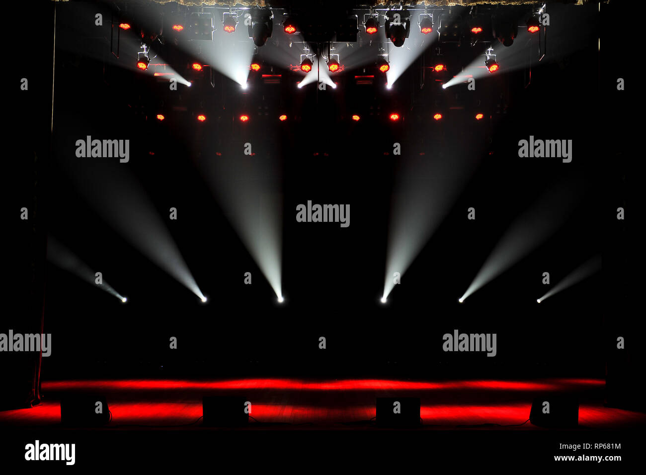 Free stage with lights, lighting devices. Night show Stock Photo - Alamy