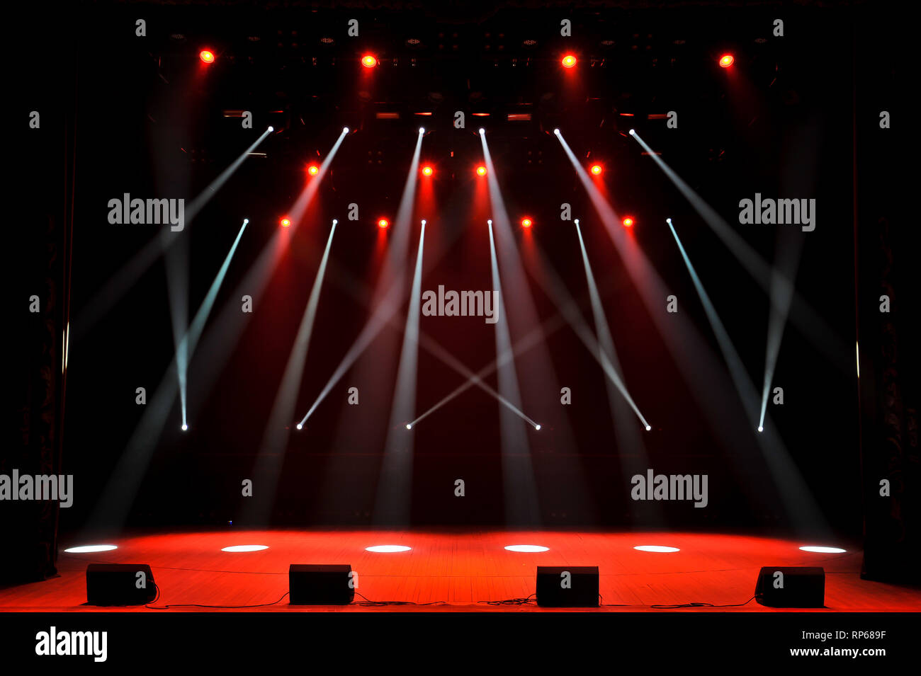 Free stage with lights, lighting devices. Night show Stock Photo - Alamy