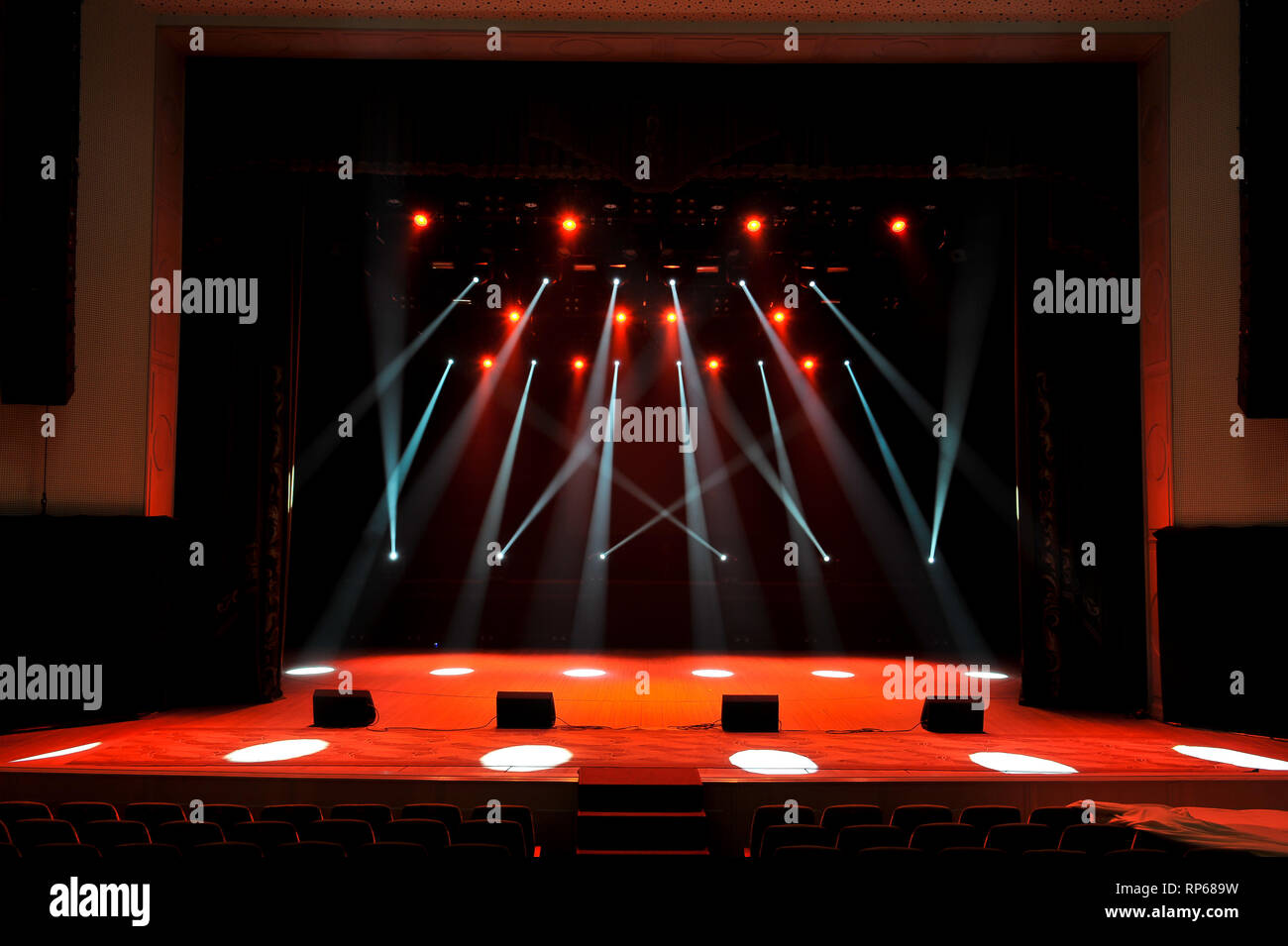 Free stage with lights, lighting devices. Night show Stock Photo - Alamy