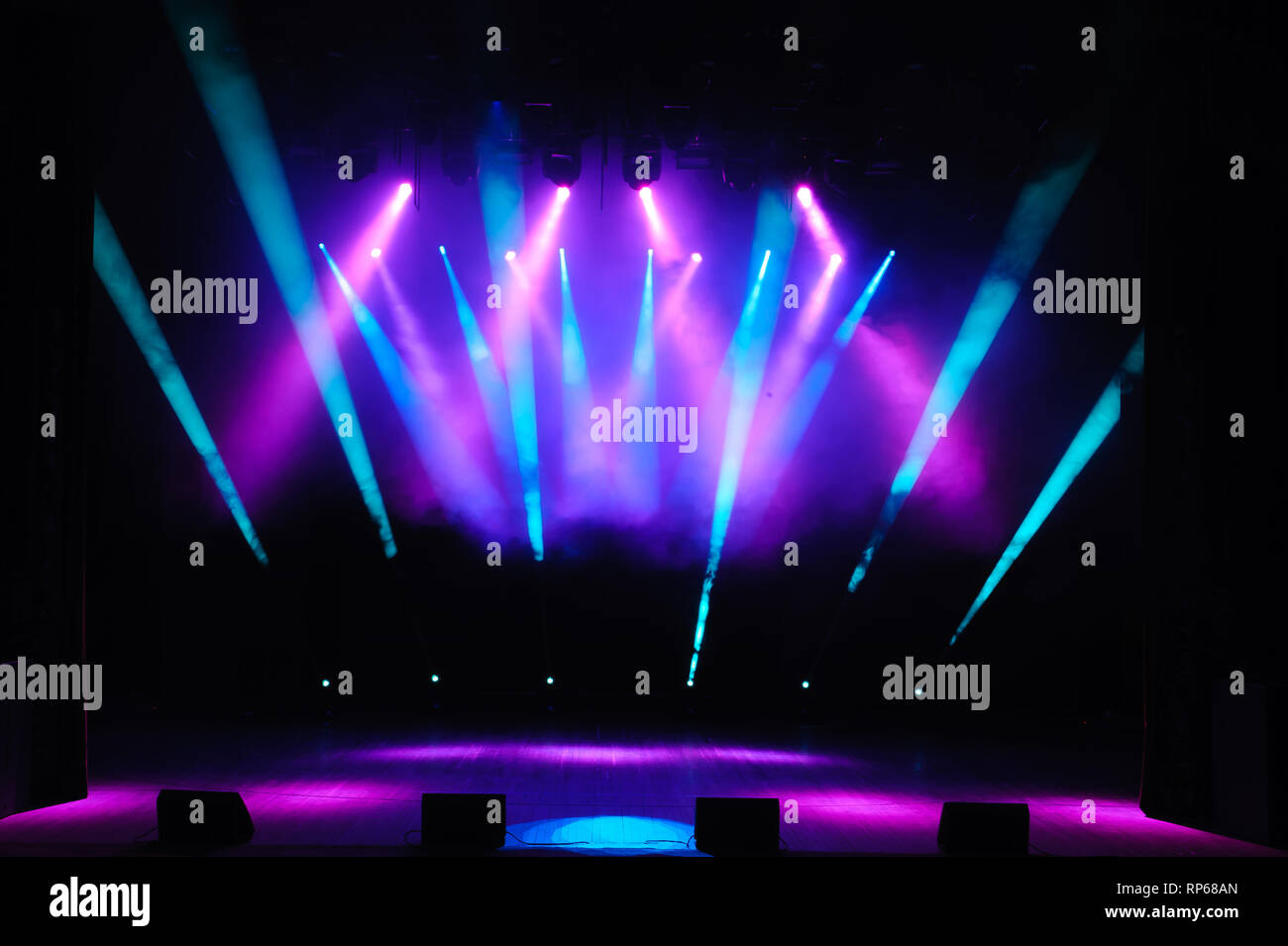 Free stage with lights, lighting devices. Night show Stock Photo - Alamy