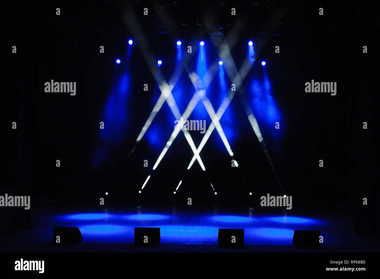 Free stage with lights, lighting devices. Night show Stock Photo - Alamy