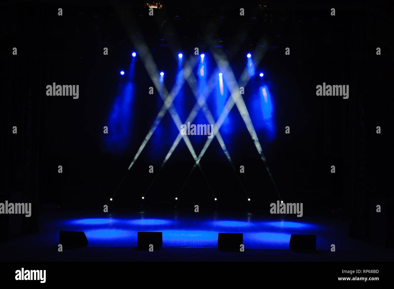 Free stage with lights, lighting devices. Night show Stock Photo - Alamy