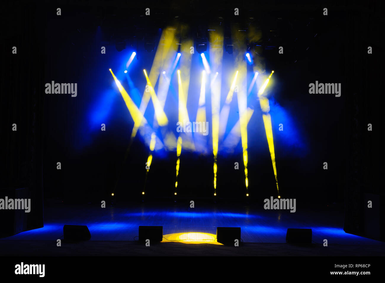 Free stage with lights, lighting devices. Night show Stock Photo - Alamy