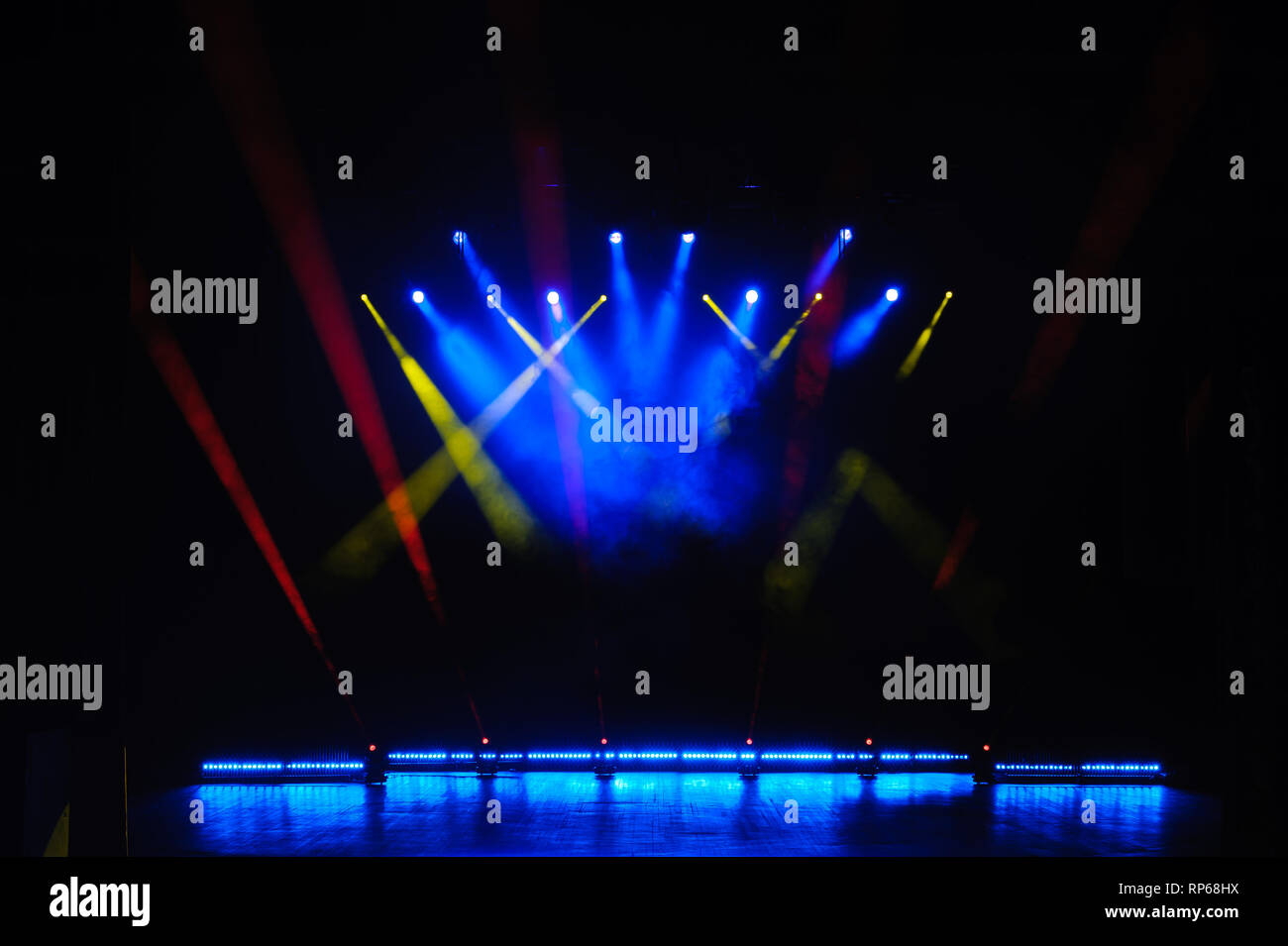 Free stage with lights, lighting devices. Night show Stock Photo - Alamy