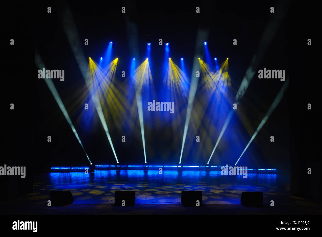 Free stage with lights, lighting devices. Night show Stock Photo - Alamy