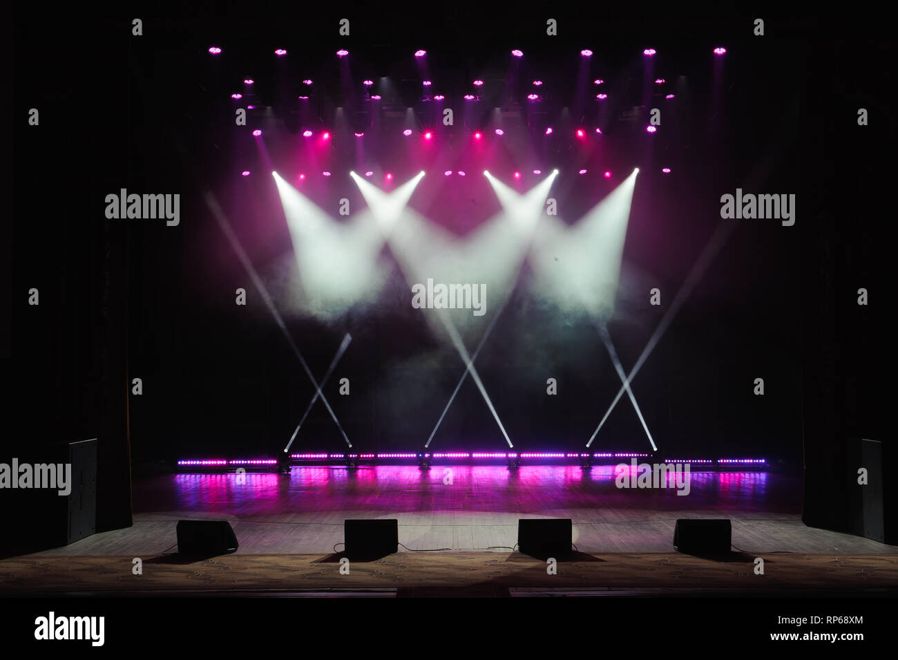 Free stage with lights, lighting devices. Night show Stock Photo - Alamy
