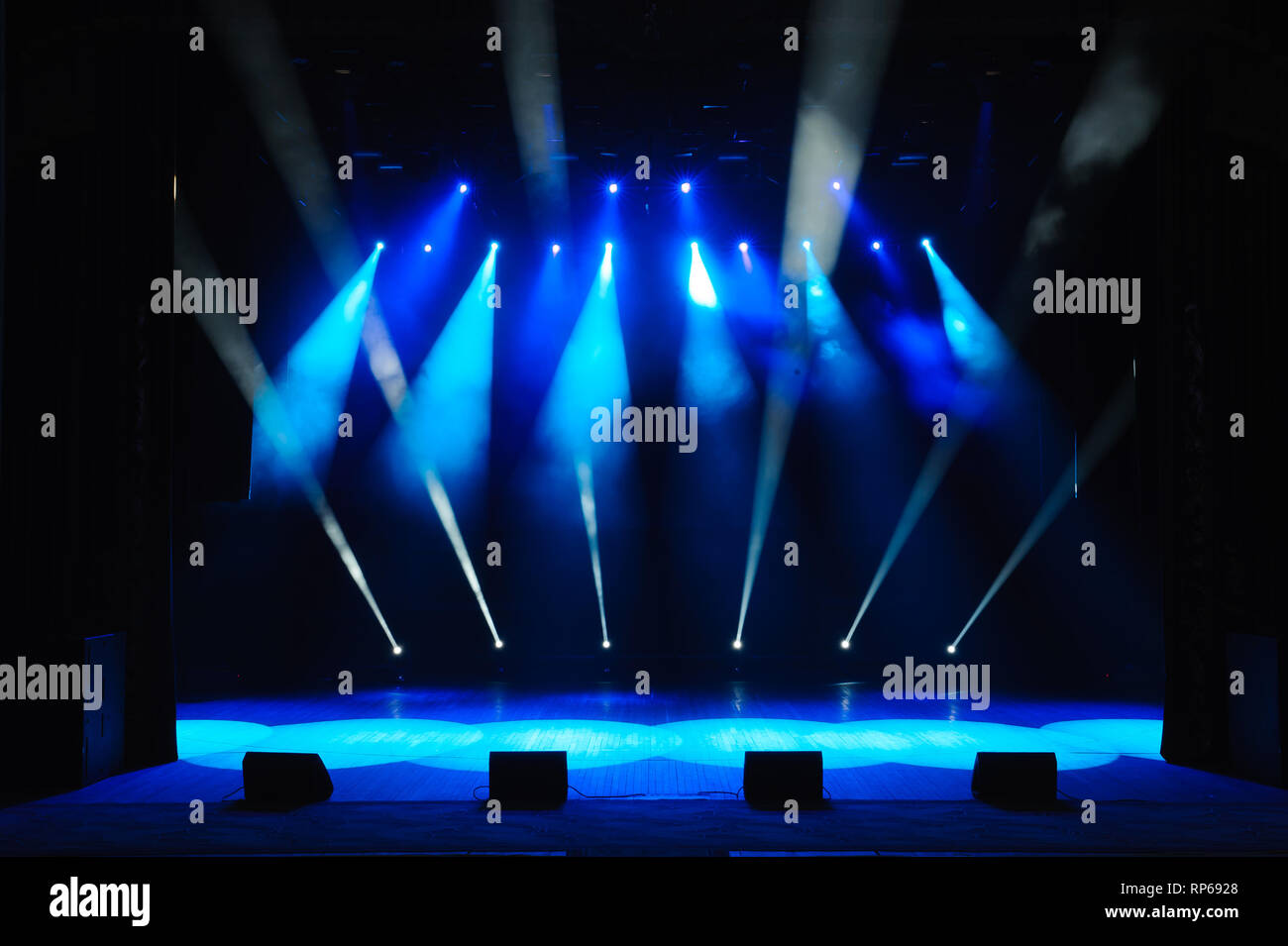 Free stage with lights, lighting devices. Night show Stock Photo - Alamy