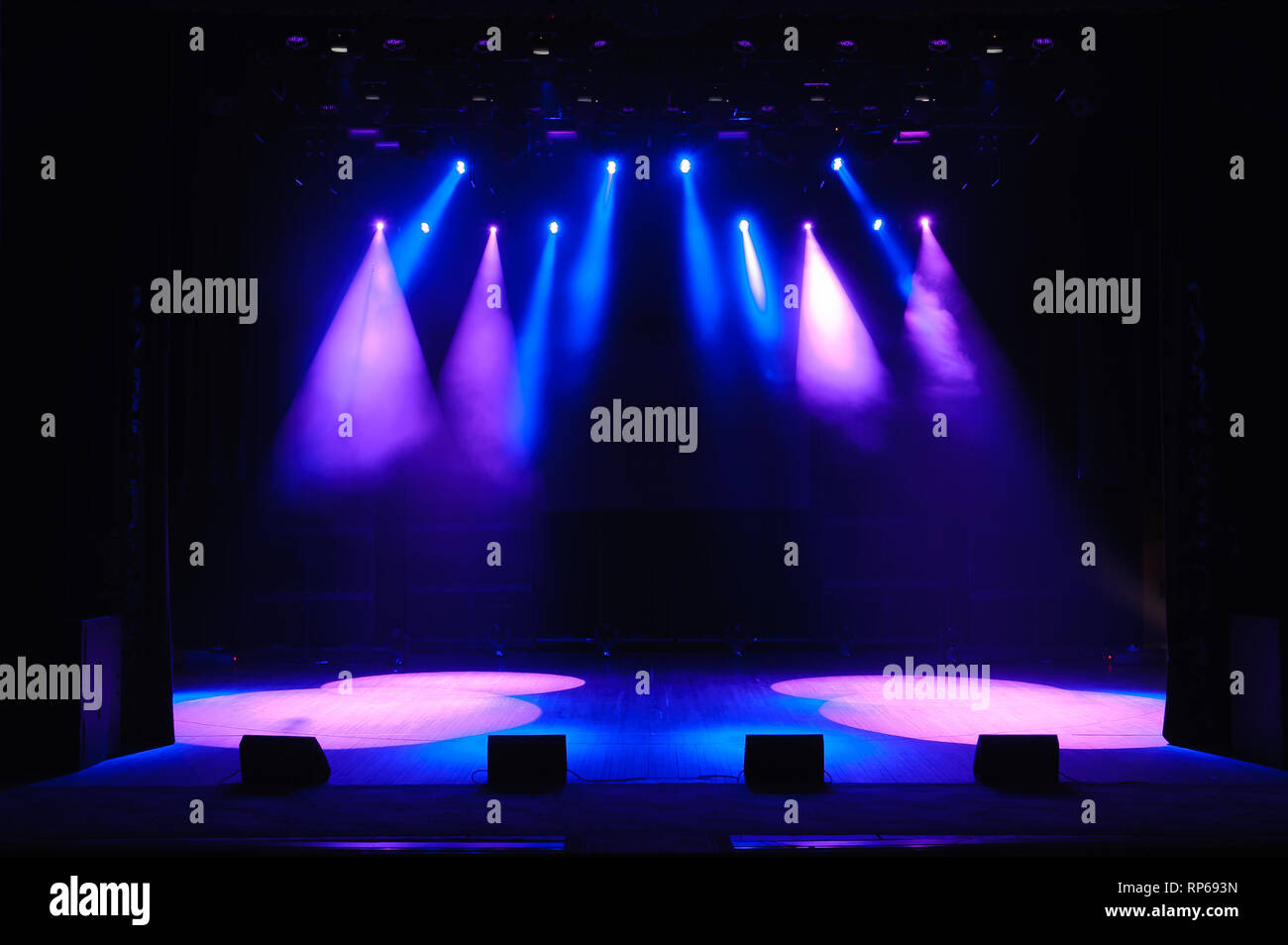Free stage with lights, lighting devices. Night show Stock Photo - Alamy
