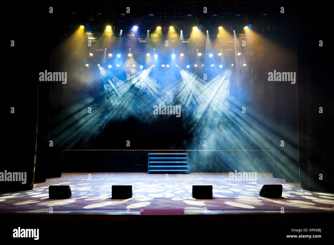 Free stage with lights, lighting devices. Night show Stock Photo - Alamy