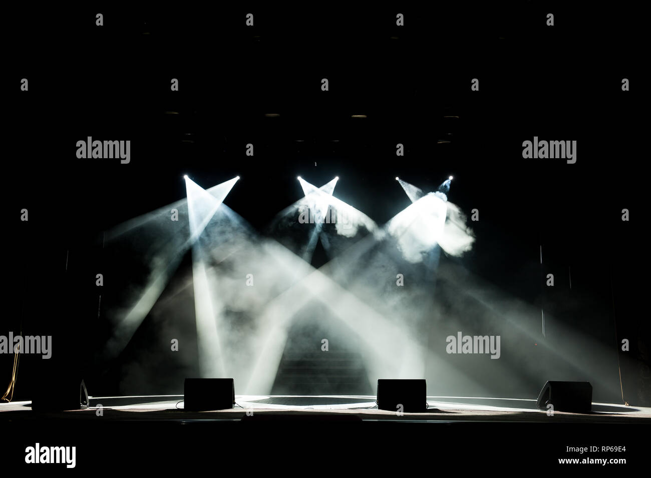 Free stage with lights, lighting devices. Night show Stock Photo - Alamy
